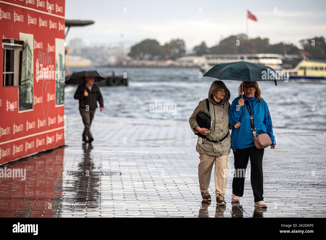Istanbul, Turkey. 22nd Sep, 2022. People seen walking with umbrellas ...