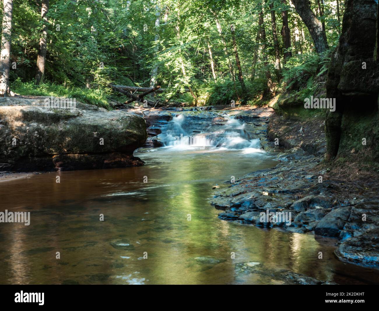 Perry Creek flows over the rocks in a small gorge in the Perry Creek ...