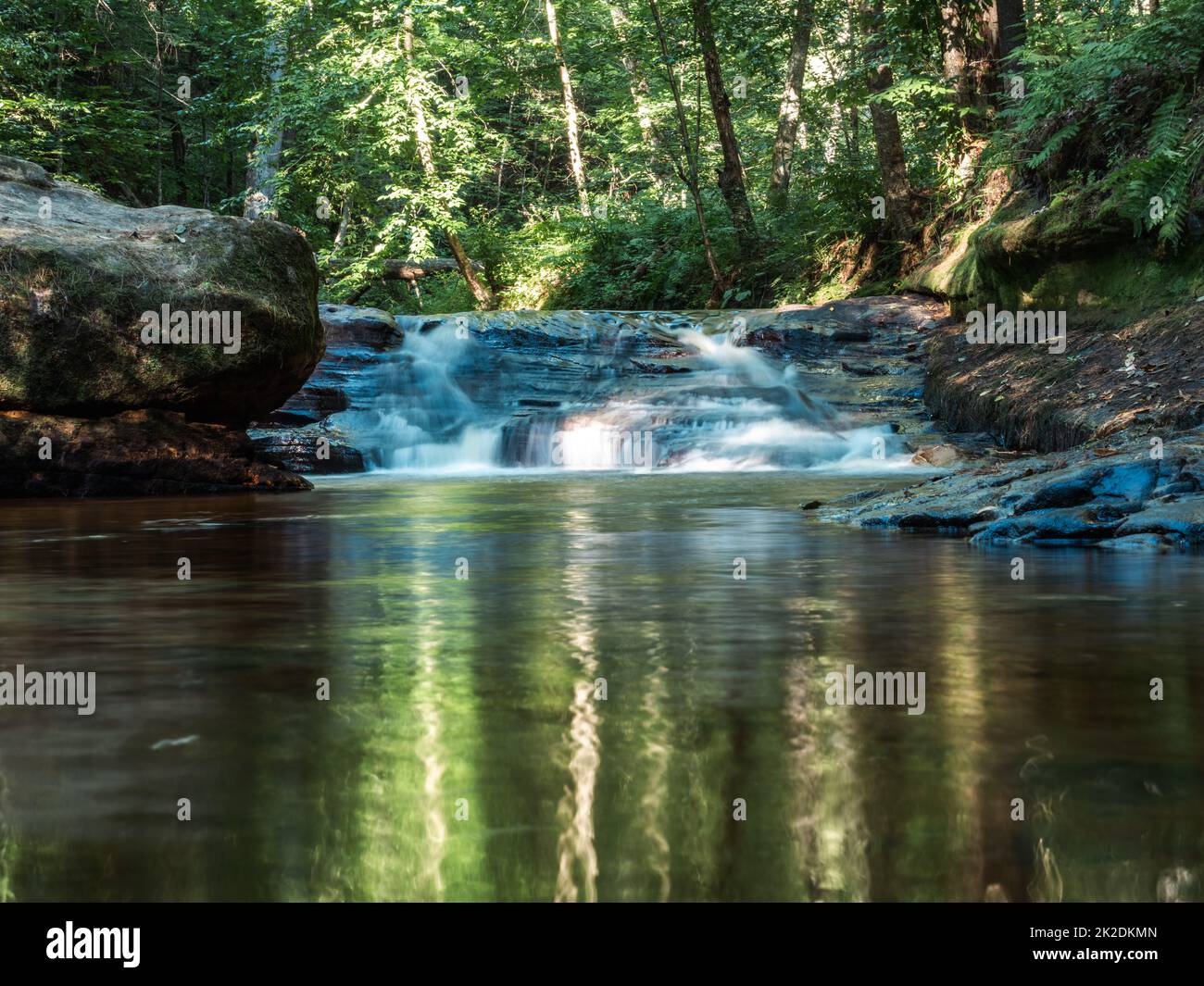 Perry Creek flows over the rocks in a small gorge in the Perry Creek ...