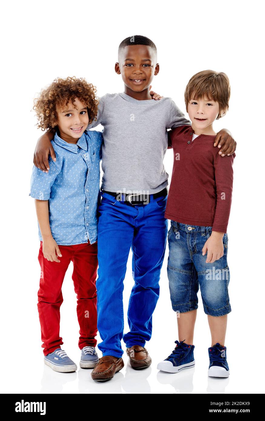 Just us boys. Studio shot of three cute little boys posing together ...