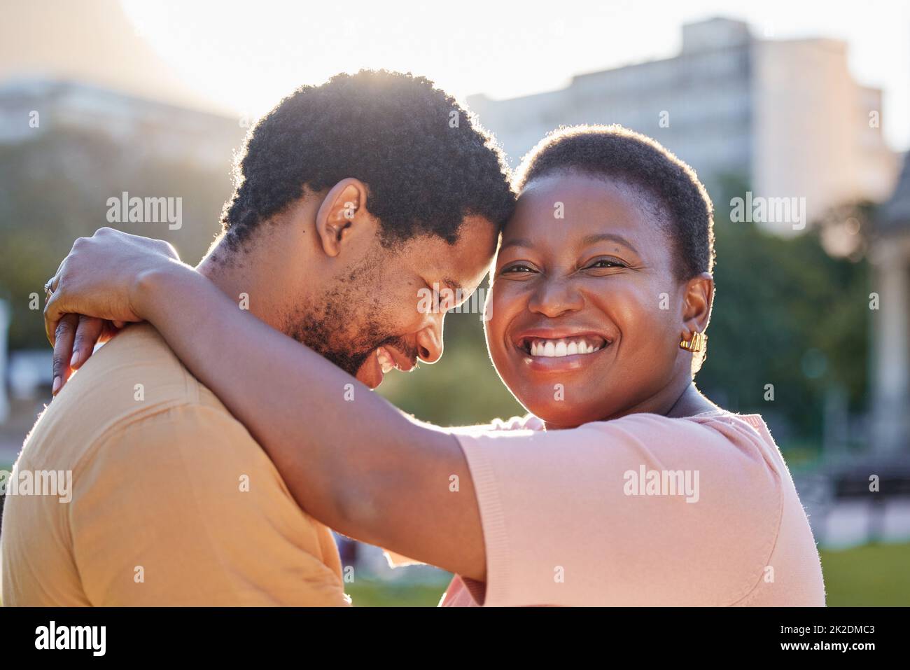 Happy African Couple Hugging In Outdoor Garden On Romantic Picnic Date