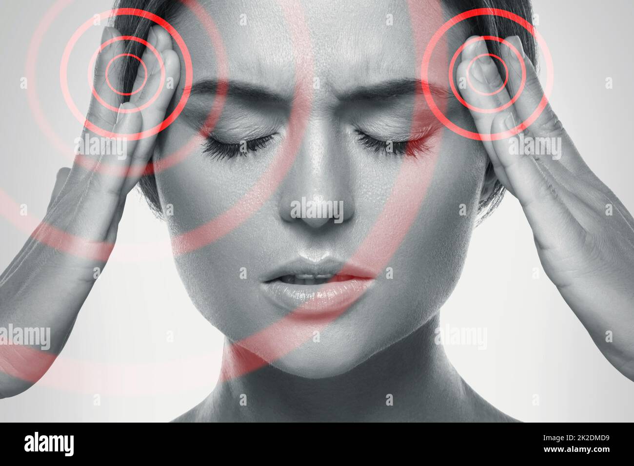 Woman with a headache on white background Stock Photo - Alamy