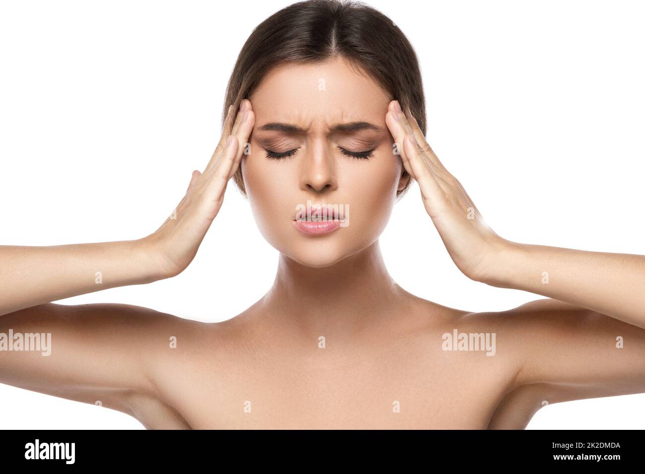 Woman with a strong headache on white background Stock Photo - Alamy