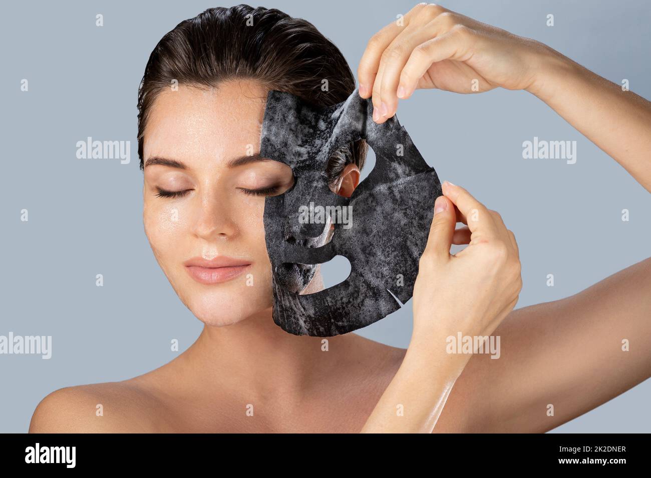 Removing the mask hi-res stock photography and images - Alamy