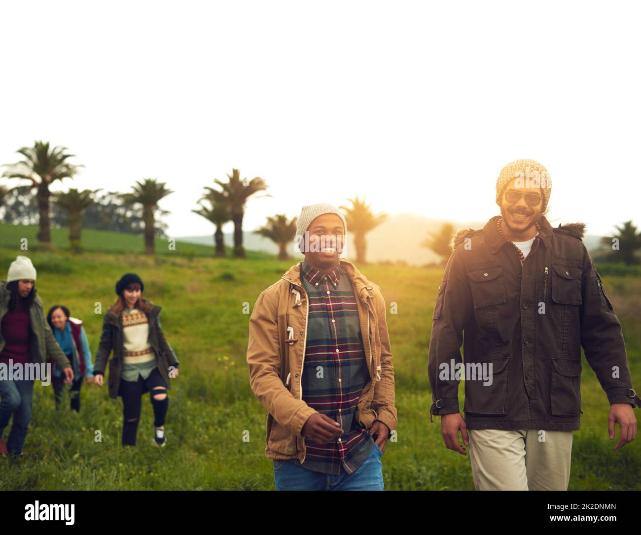 Discovering new places together. Shot of a group of friends walking ...