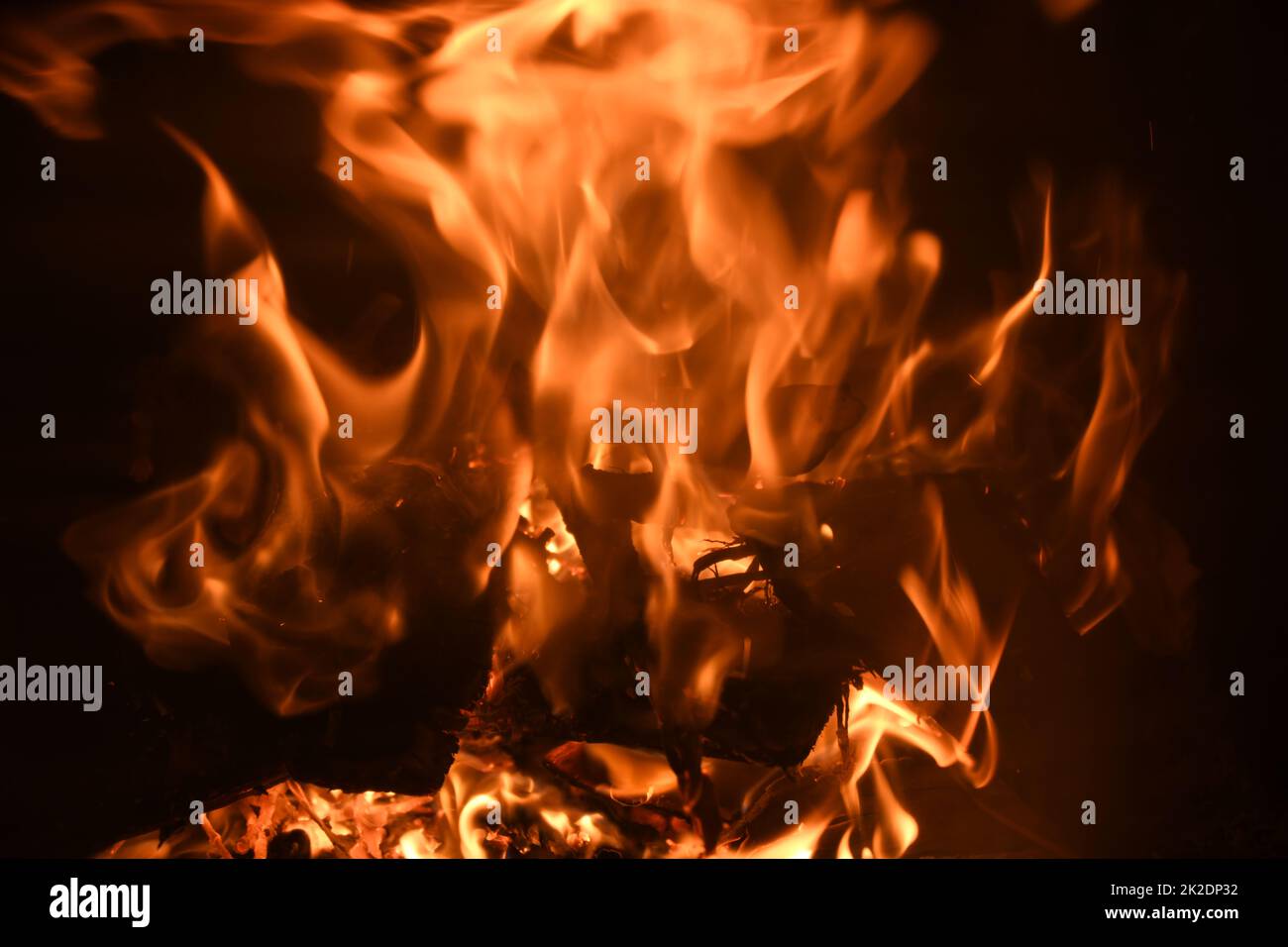 Cozy and warming log fire in the fireplace, in the province of Alicante ...