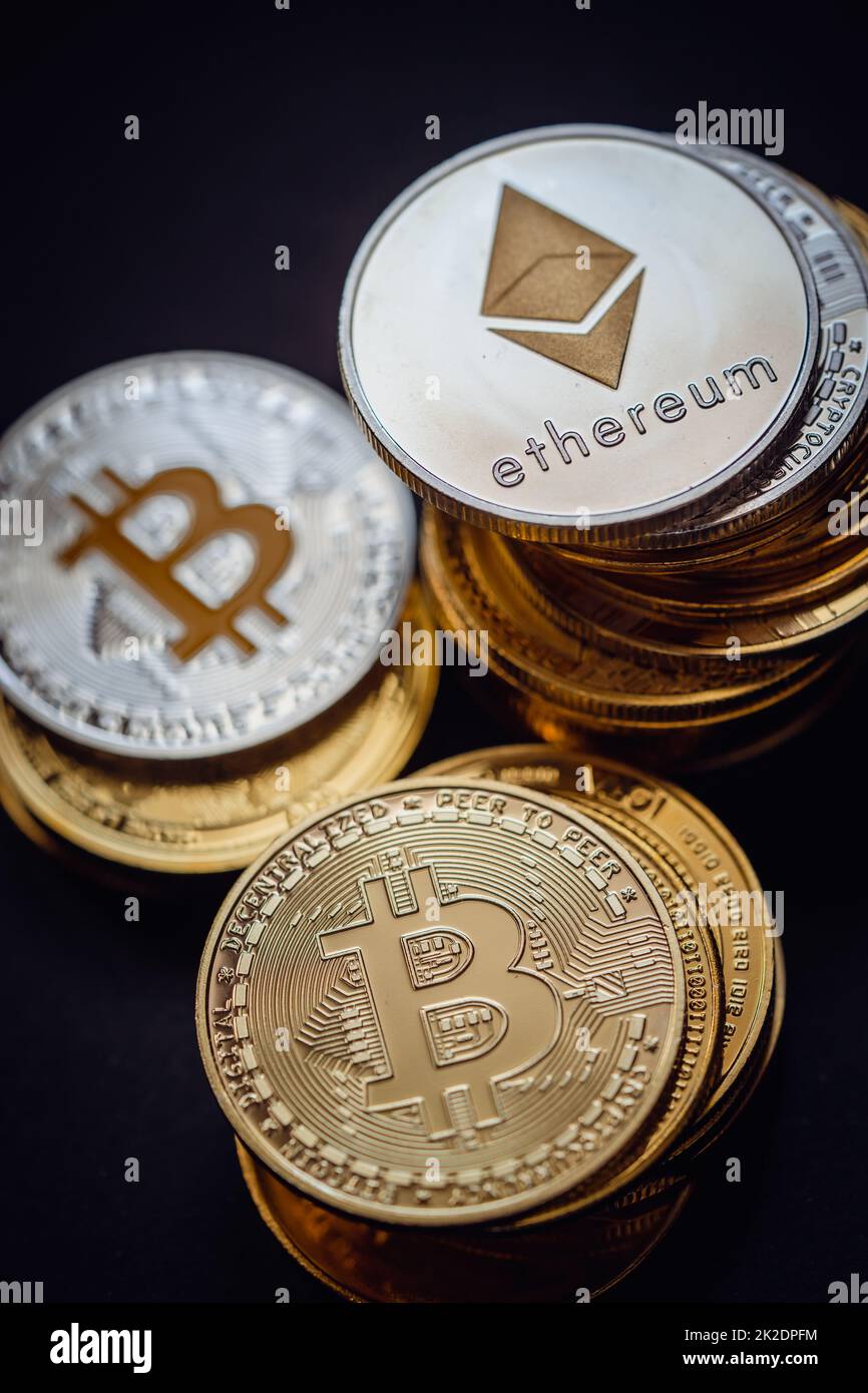 Bitcoin and Ethereum digital cryptocurrency Stock Photo - Alamy