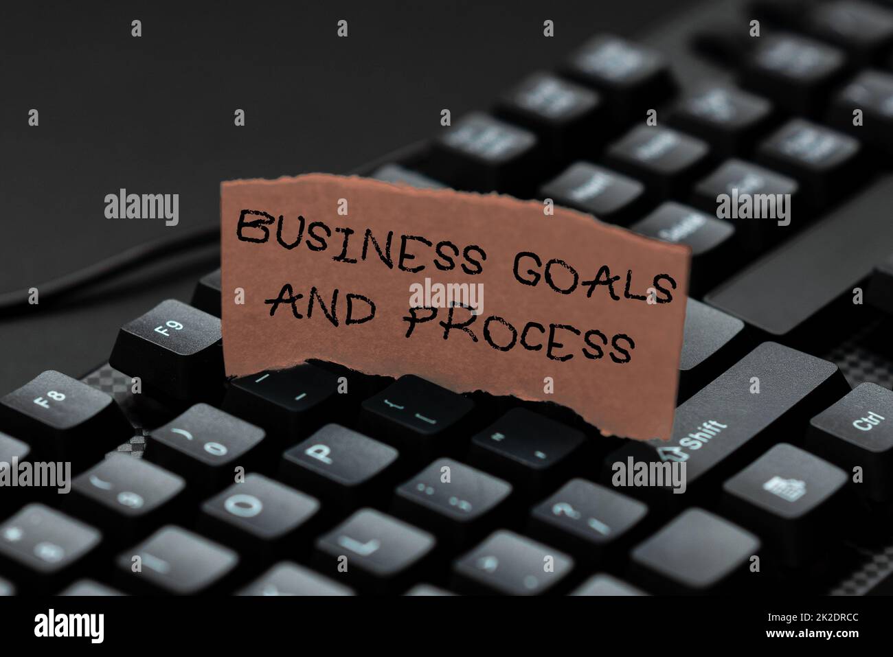 Hand writing sign Business Goals And Process. Business overview company ...