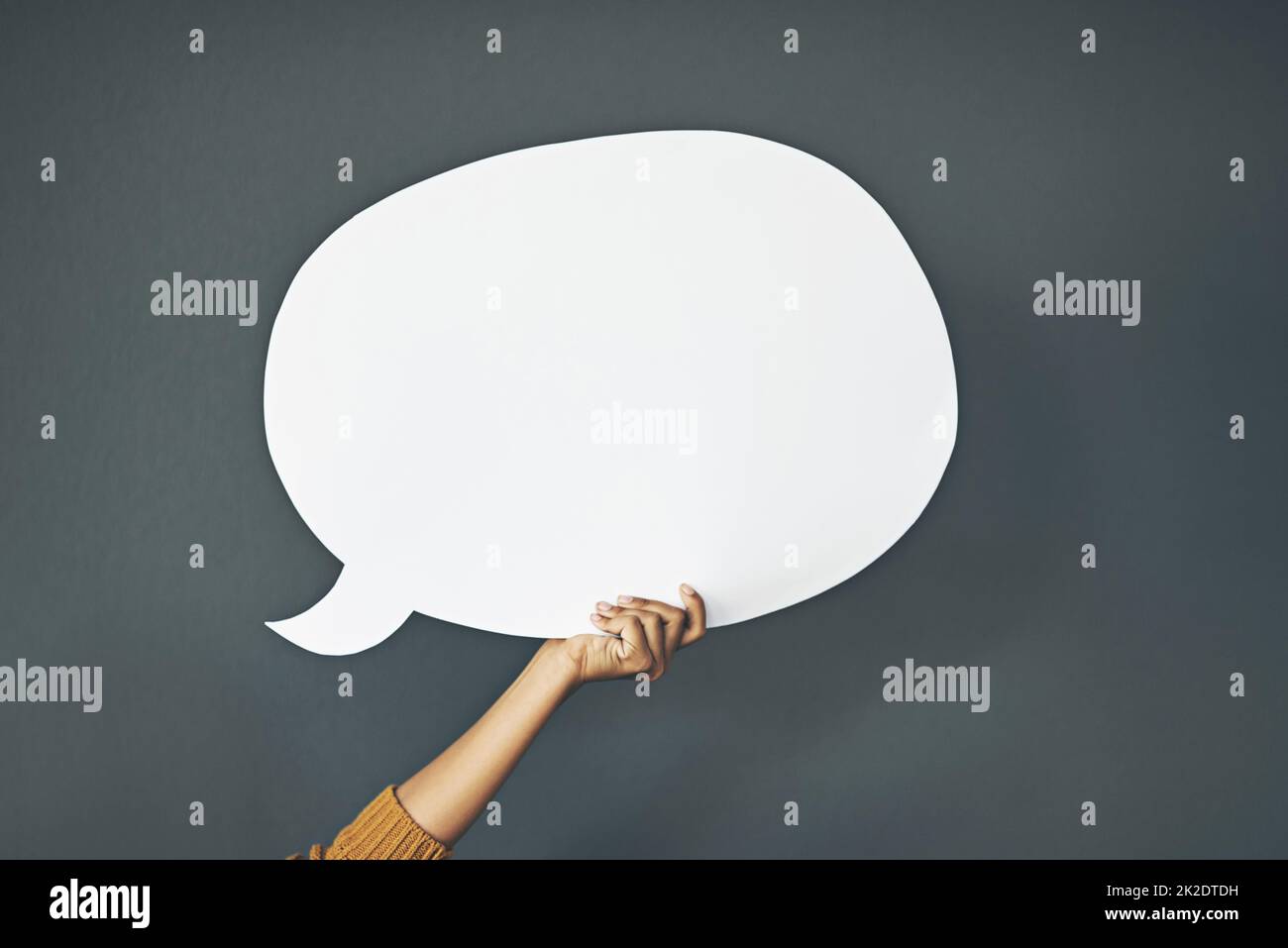 Let your message be seen and heard. Studio shot of an unrecognisable woman holding a speech ...