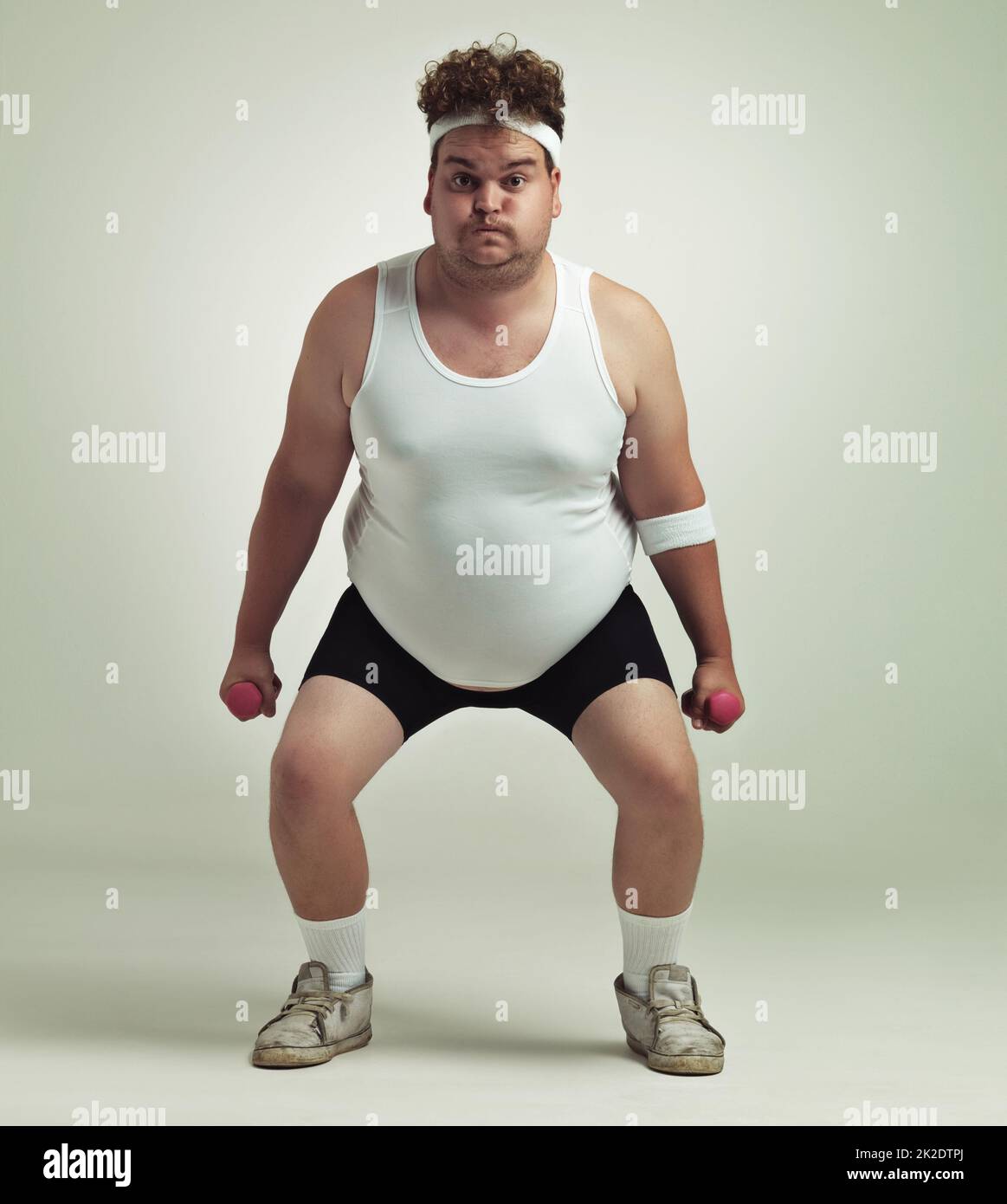 Squat with dumbbells man hi-res stock photography and images - Alamy