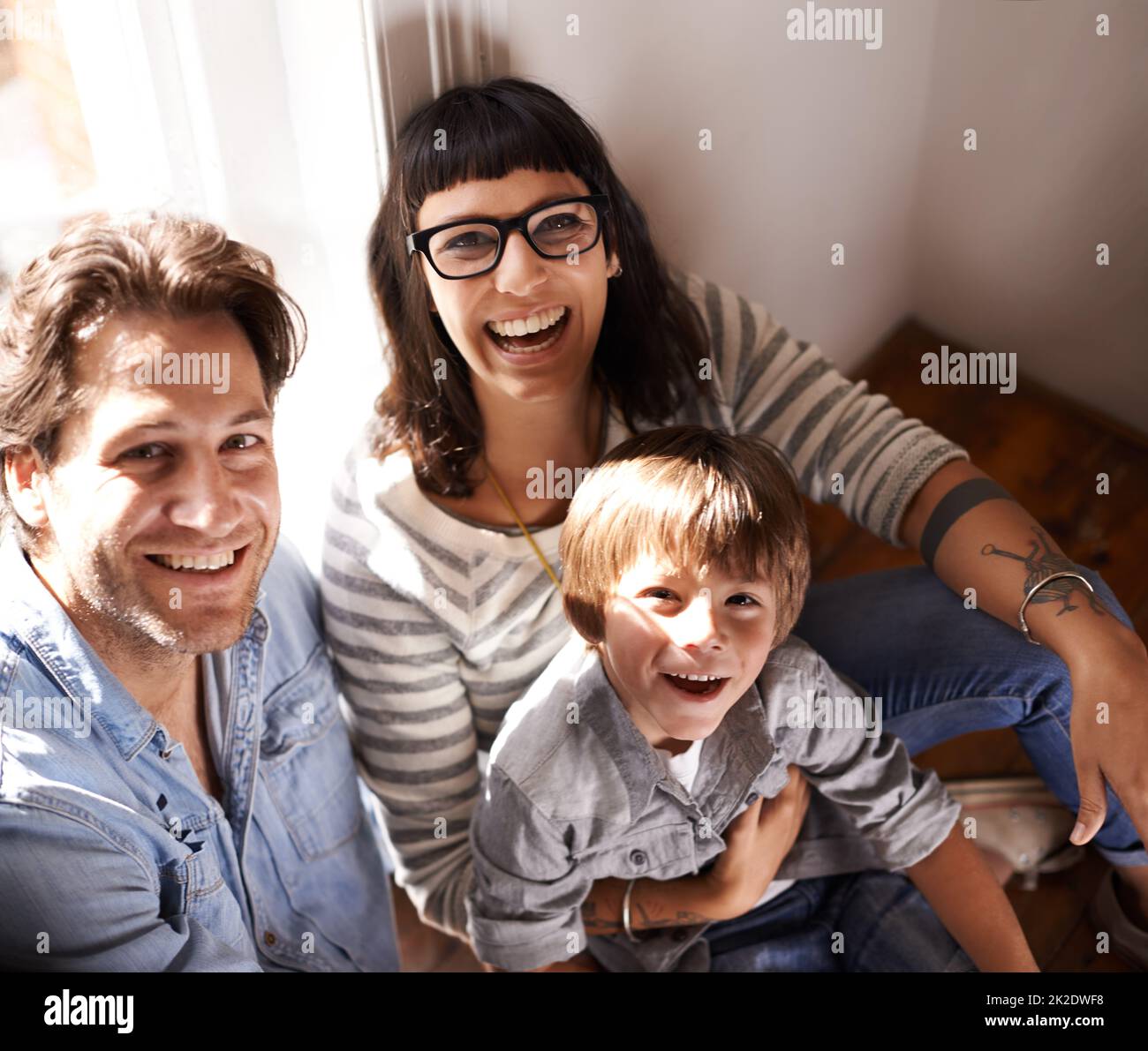 Strong family bonds lead to confident children. A mother and father ...