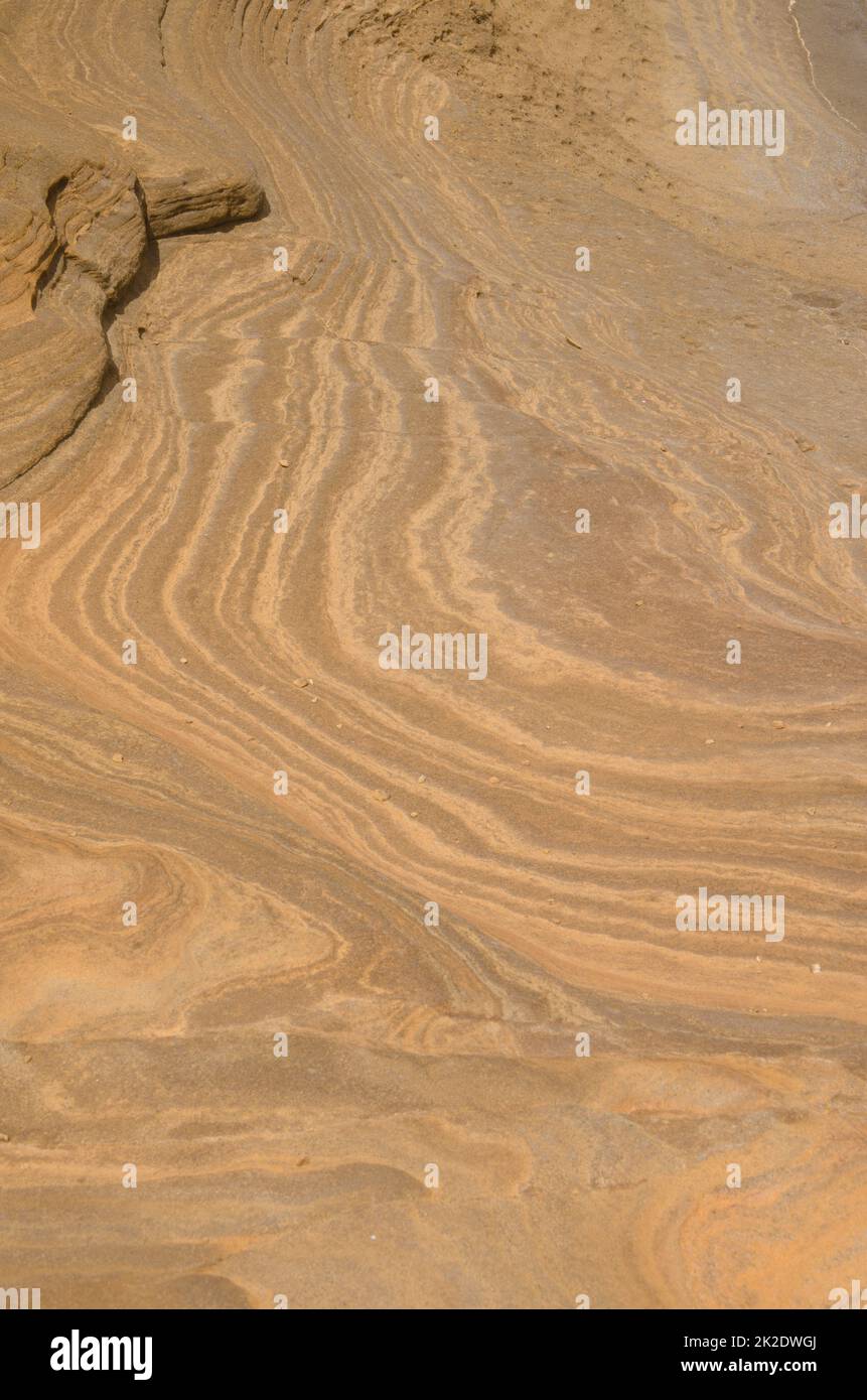 Rock surface showing different strata Stock Photo - Alamy