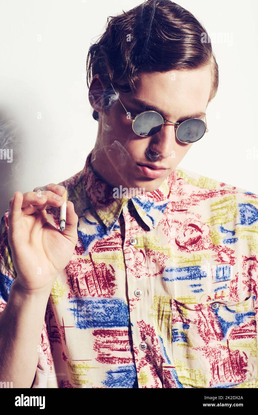 Fashion model smoking cigarette hi-res stock photography and images - Alamy