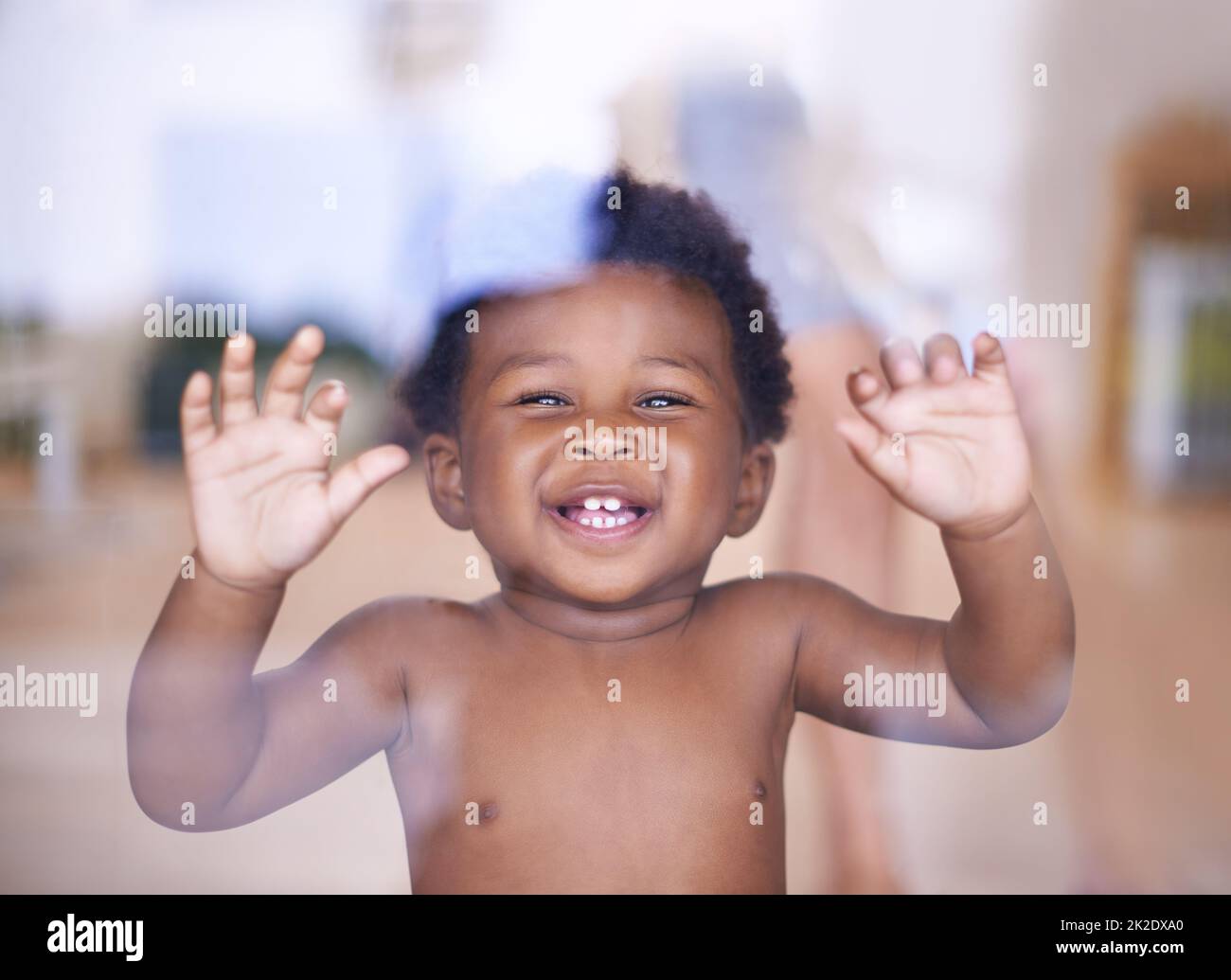Child Looking Out A Window