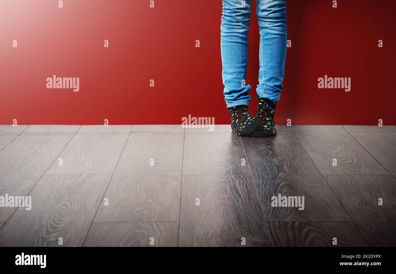 Cosy socks inspire happy feet. Cropped studio shot of a woman wearing ...