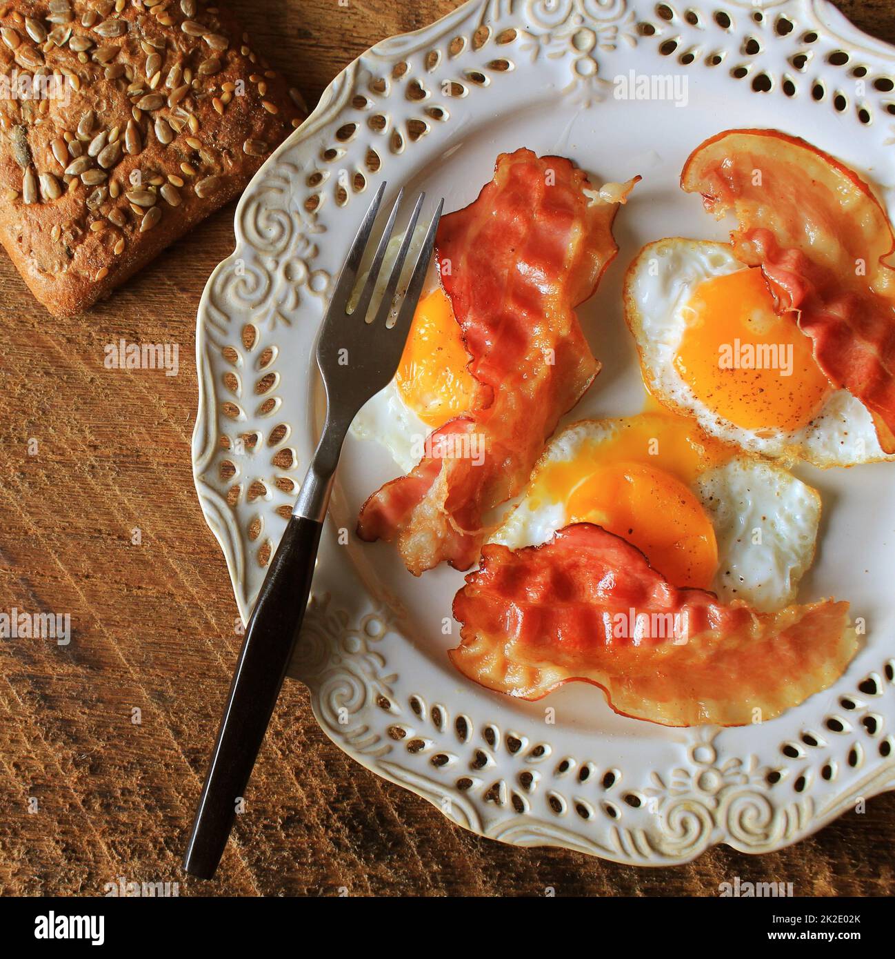 Breakfast , crispy bacon, fried eggs and bread. Sandwiches on white ...
