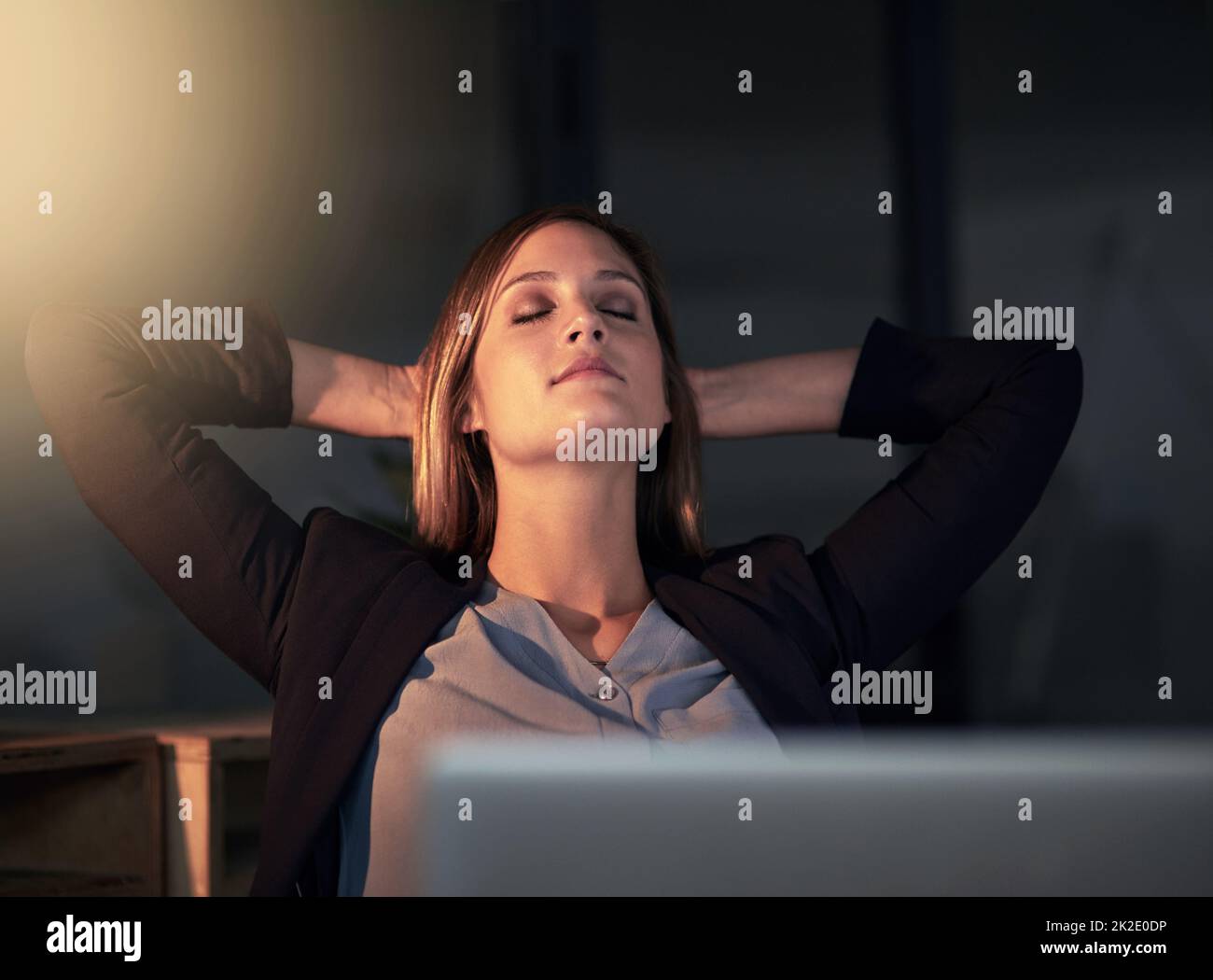 Woman leaning back in chair hi-res stock photography and images - Alamy