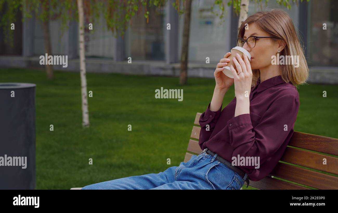 Business woman takes a break from work Stock Photo - Alamy