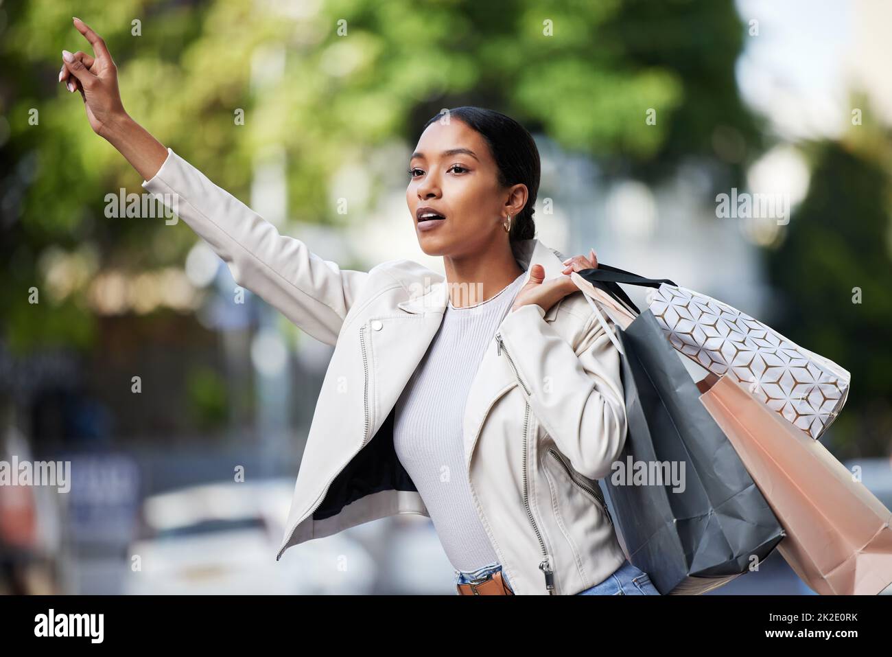 Woman shopping bags in taxi hi-res stock photography and images - Alamy