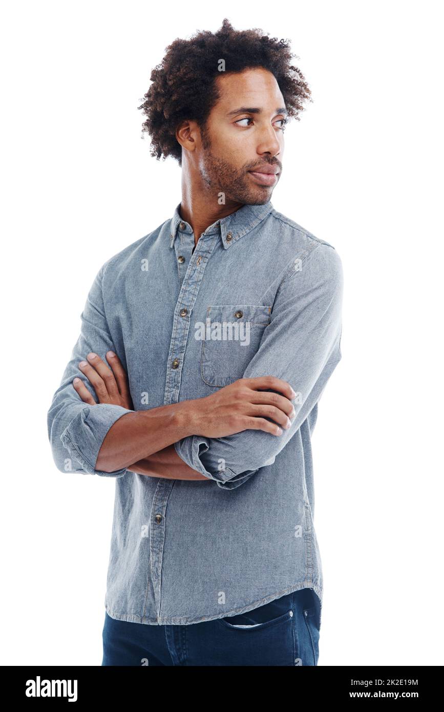 Cool, calm and collected. a handsome man with his arms crossed in ...