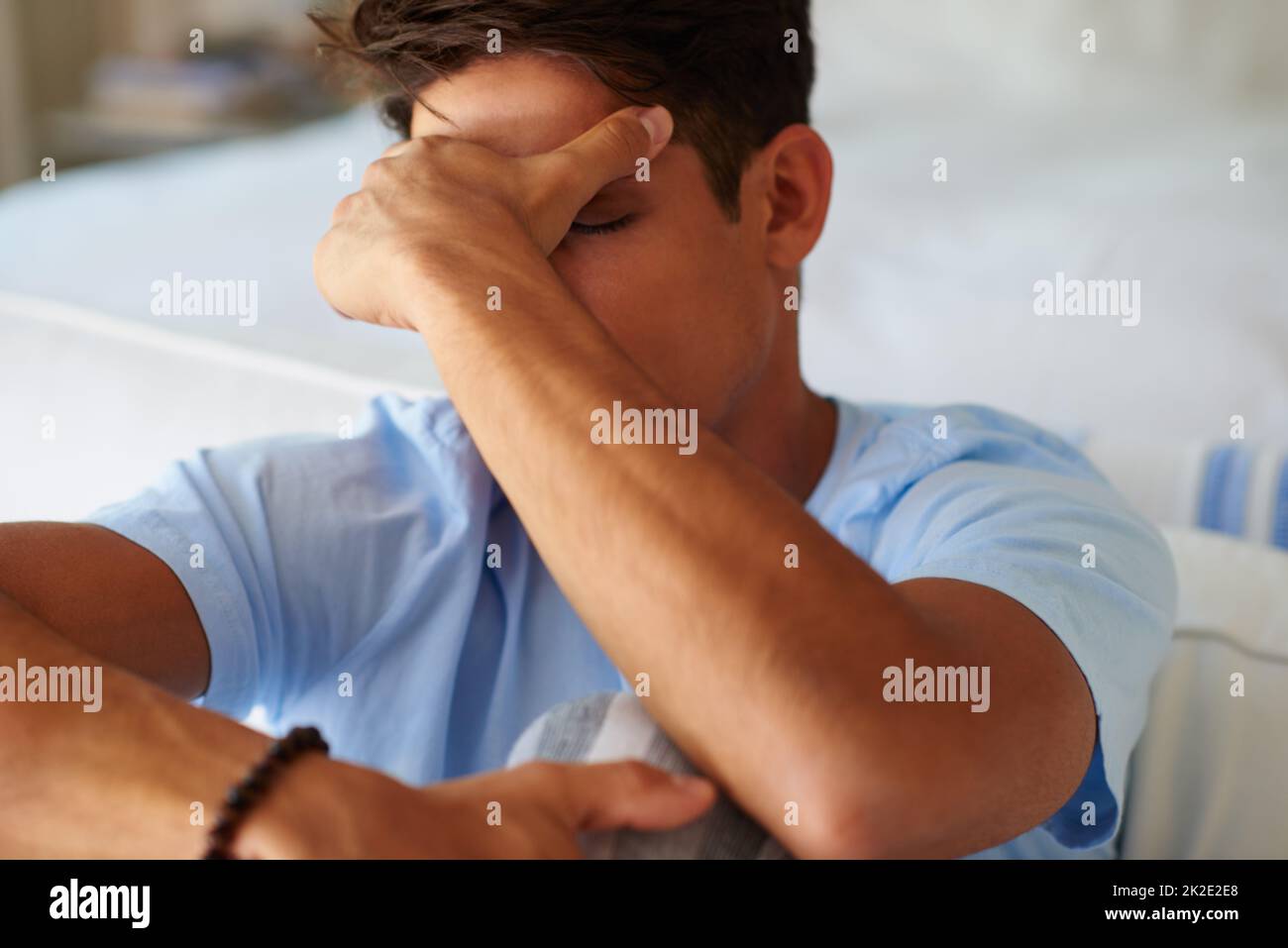 Hard thinking serious young man hi-res stock photography and images - Alamy