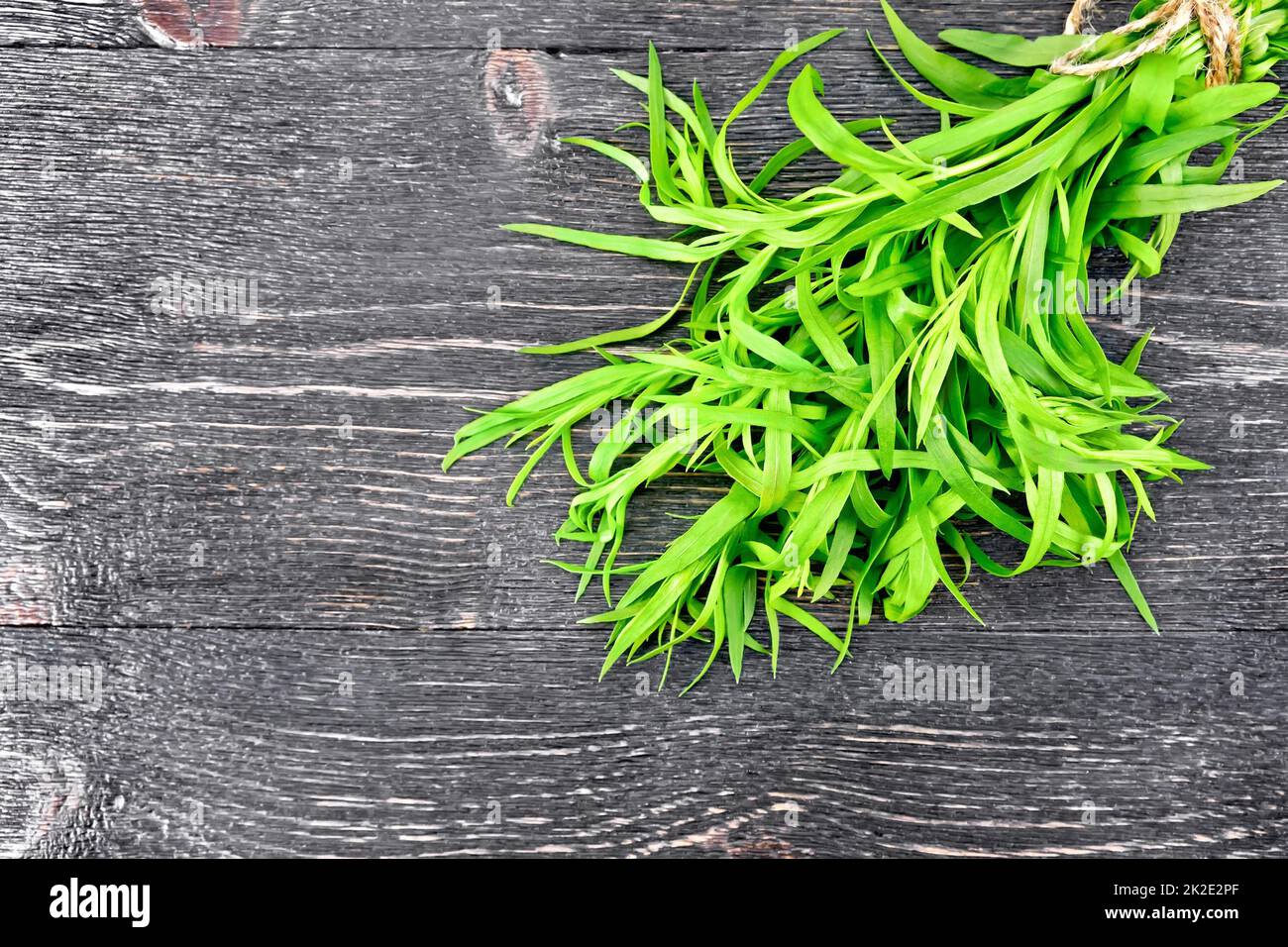 Tarragon bundle on board top Stock Photo - Alamy