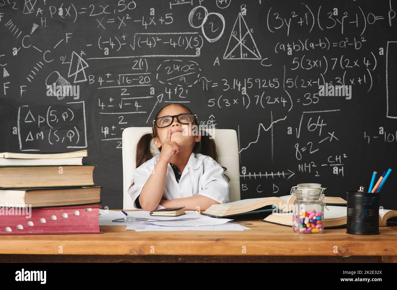 Young child thinking classroom hi-res stock photography and images - Alamy