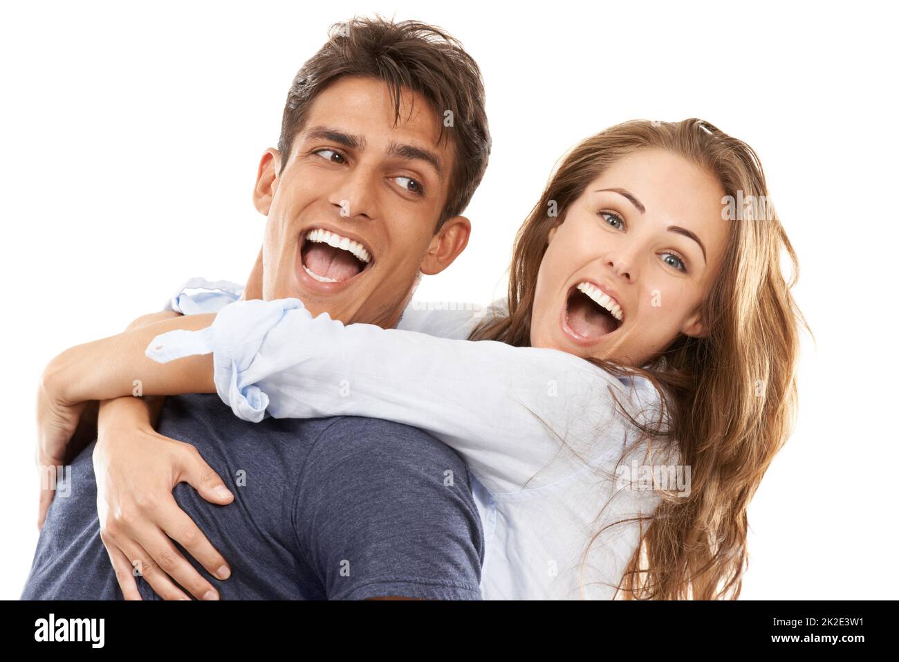 Love makes the world go round. A young couple having fun together Stock ...