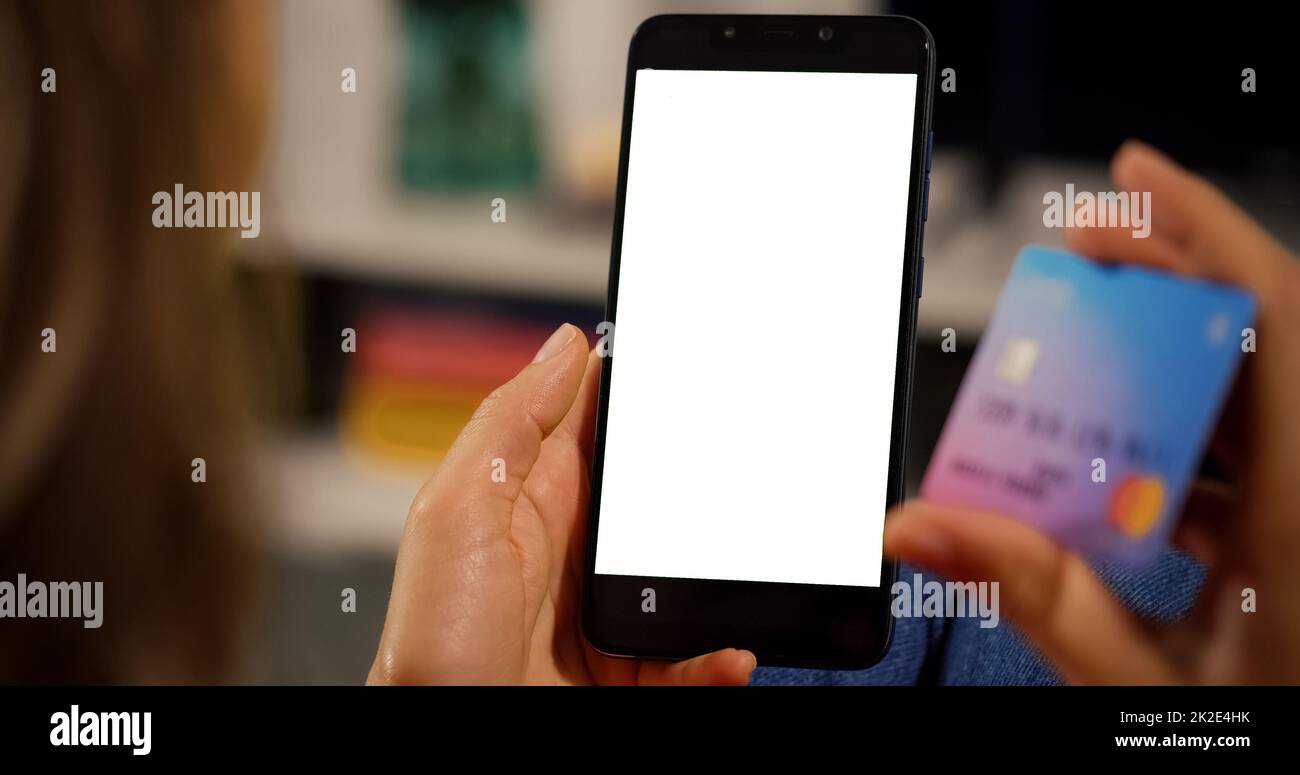 Woman Customer hands holding Credit Card and Smartphone with White ...