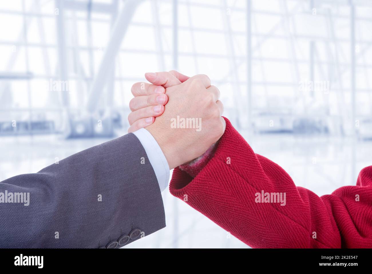 Connected hands at the office Stock Photo - Alamy
