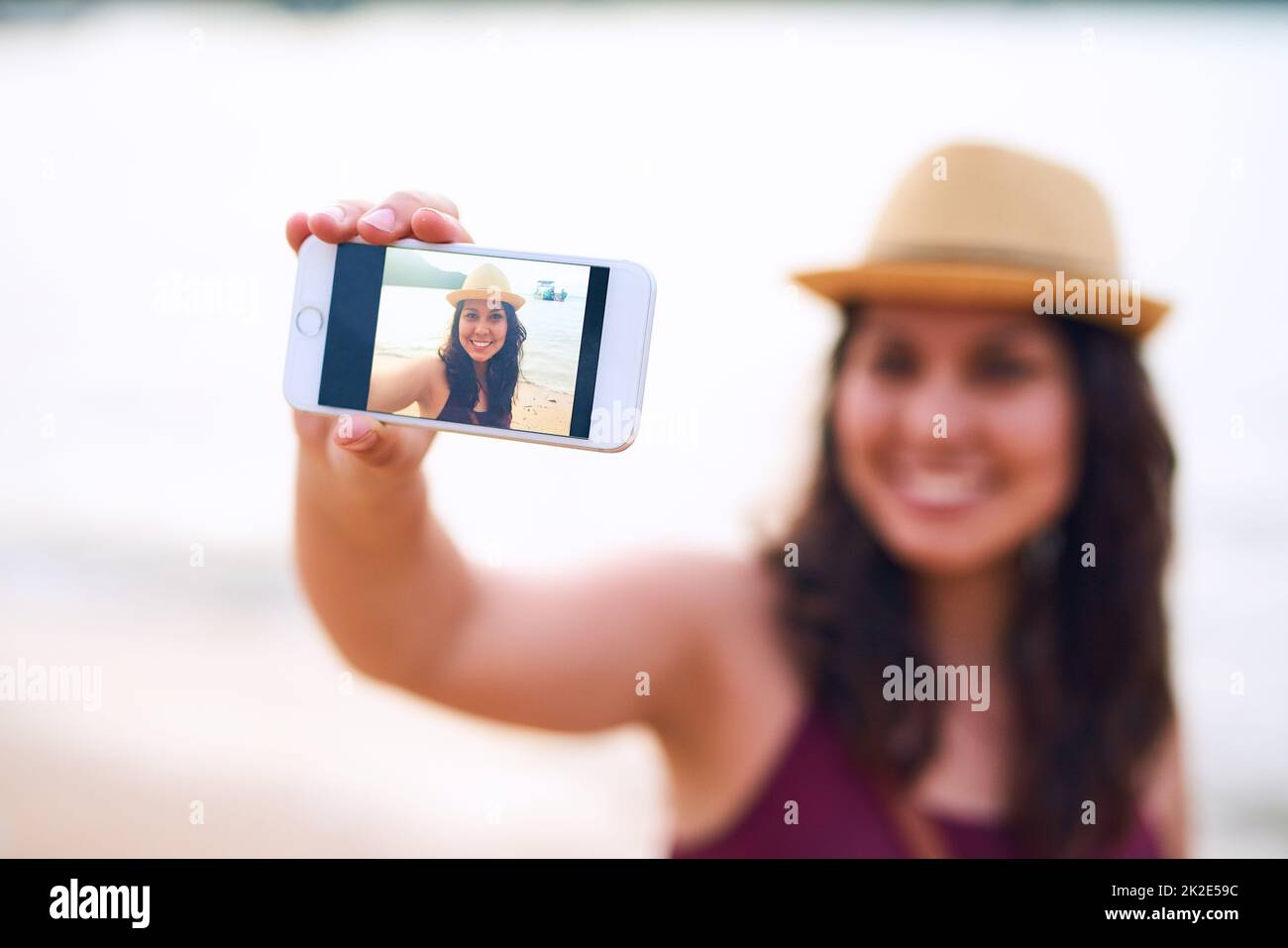 I Was Here Cropped Shot Of An Attractive Young Woman Taking Selfies At