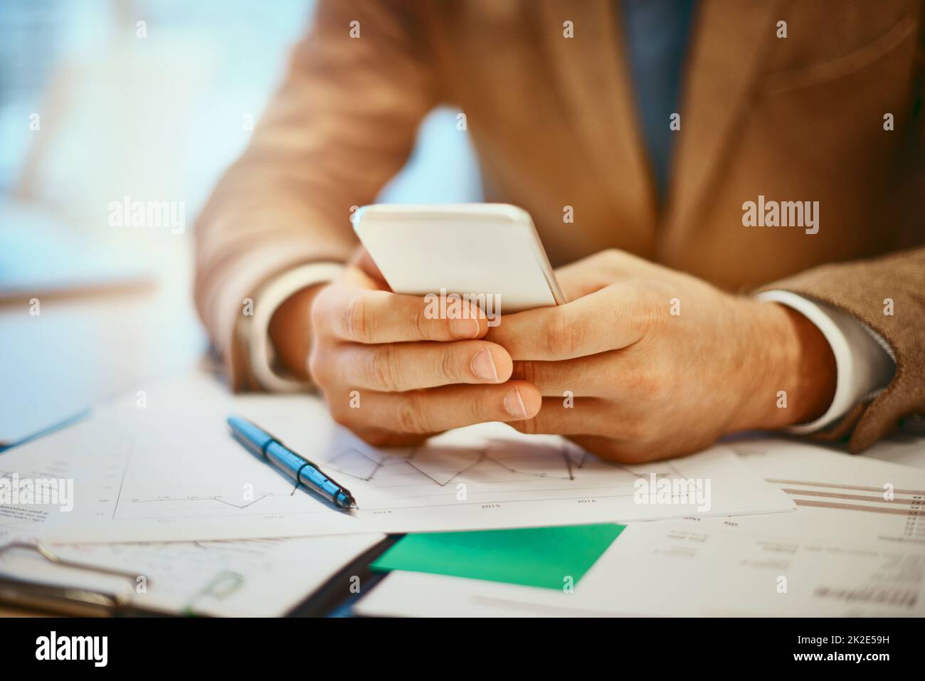 Communication is the secret behind his success. High angle shot of an ...