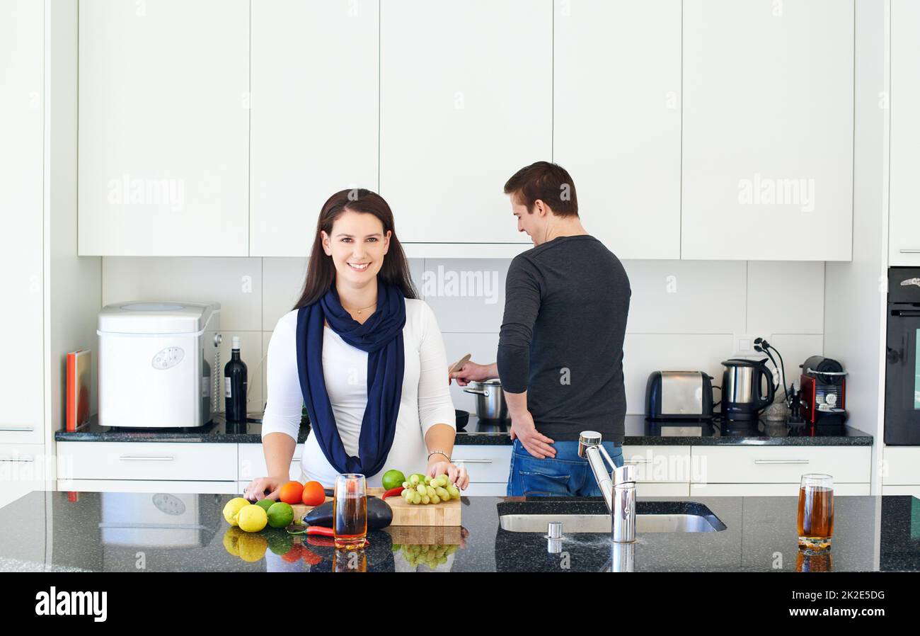 Nothing better than a home cooked meal. Cropped shot of a couple ...