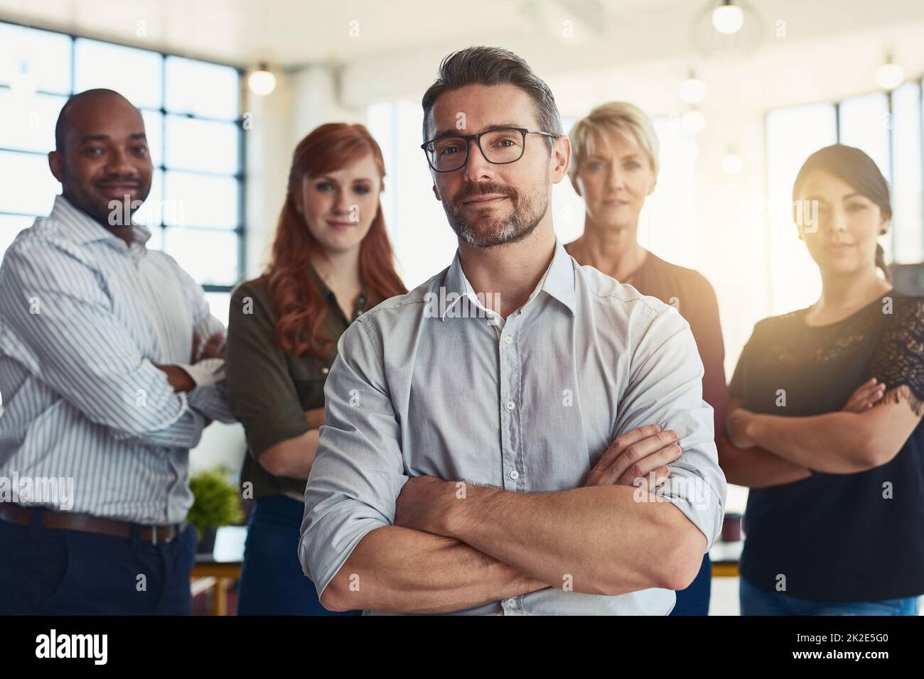 Leading the way to excellence. Portrait of a group of designers ...