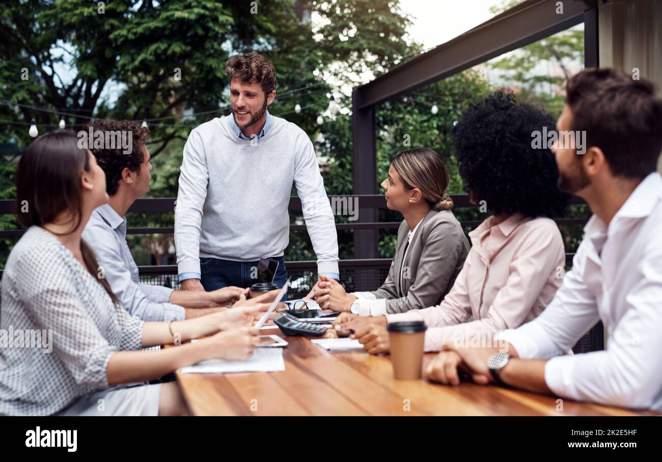 Young people presentation outdoors hi-res stock photography and images ...