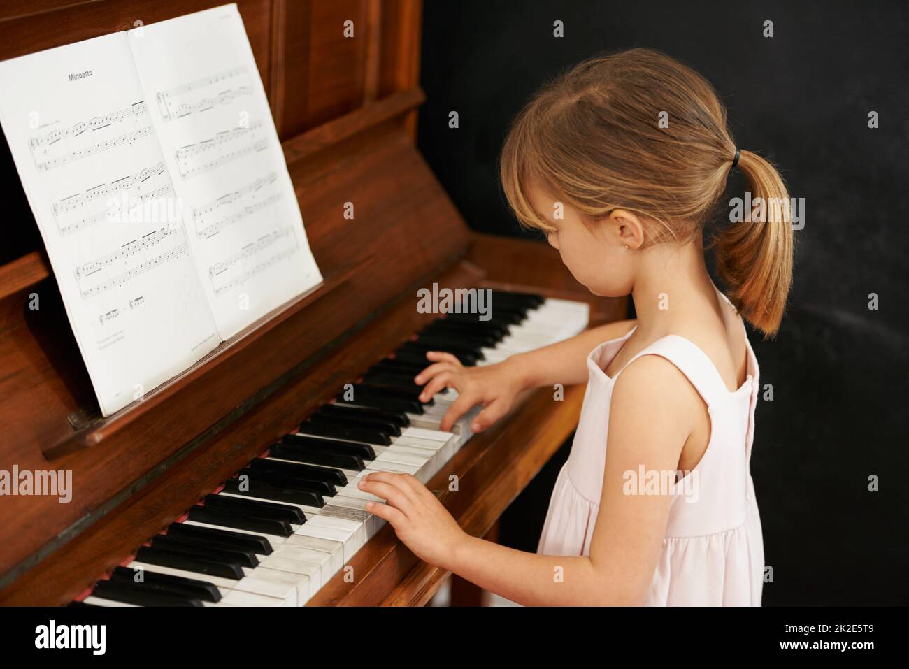 Girl Playing Piano At Recital