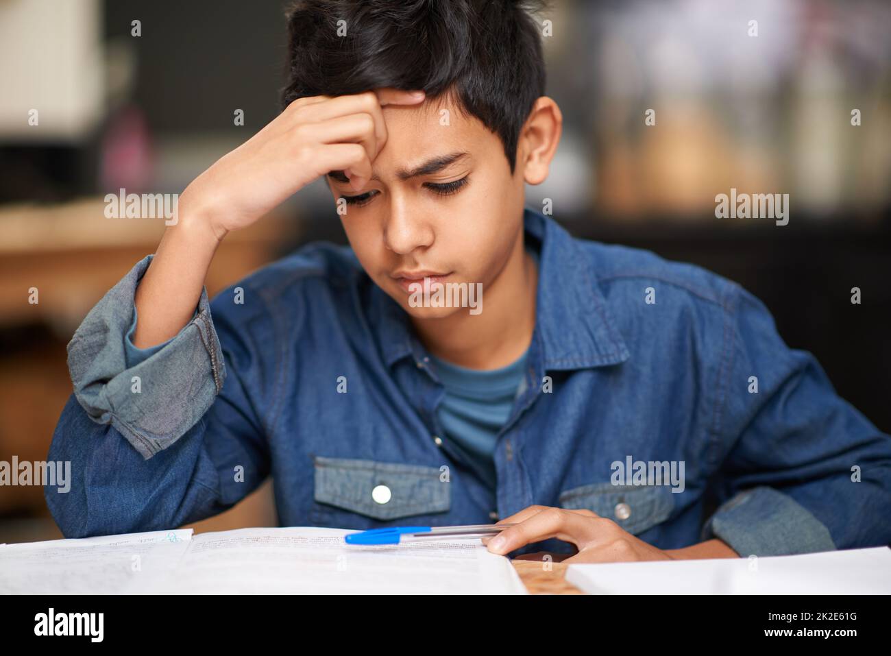 Boy students working at desk hi-res stock photography and images - Alamy