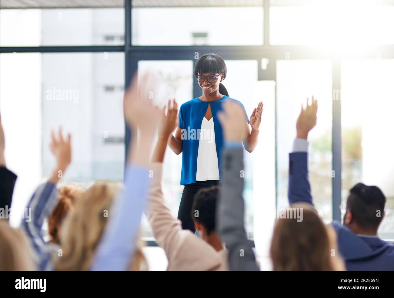 Business people raising hands hi-res stock photography and images - Alamy