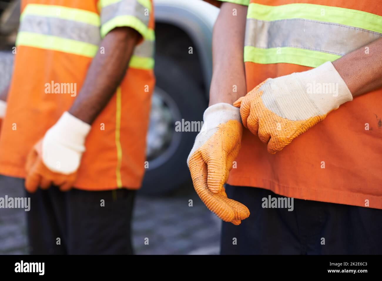 Garbage collectors outside of a building hi-res stock photography and ...