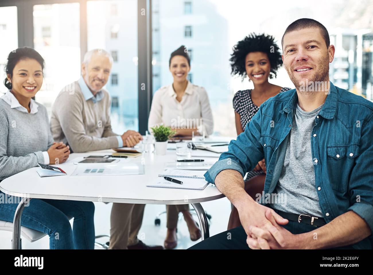 Woman surrounded by men in workplace hi-res stock photography and ...