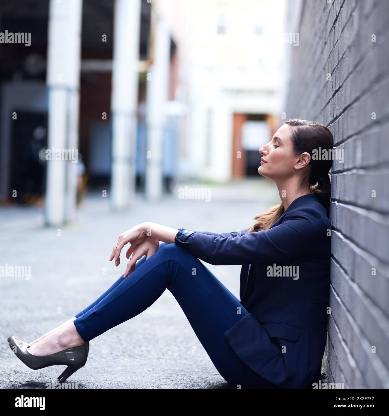 Its the quiet moments that keep her focused. Shot of an attractive ...