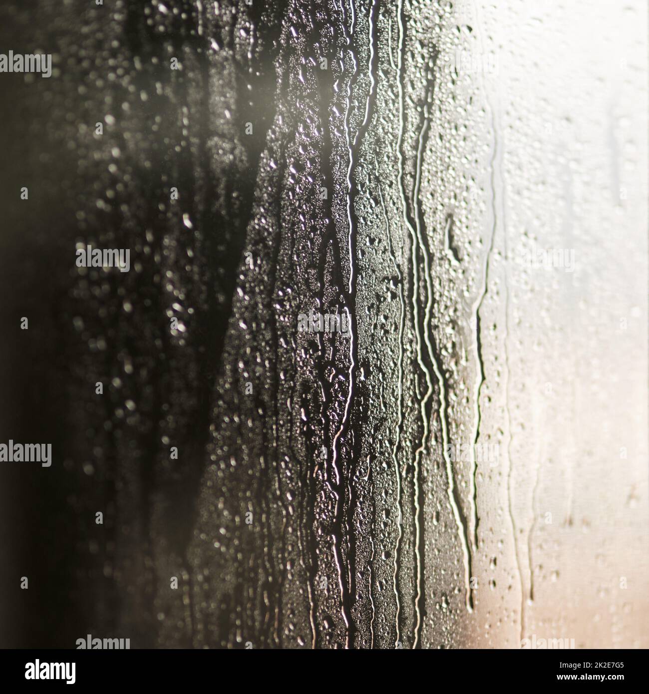 Rivulets and rain. Shot of drops of water on a smooth surface Stock ...