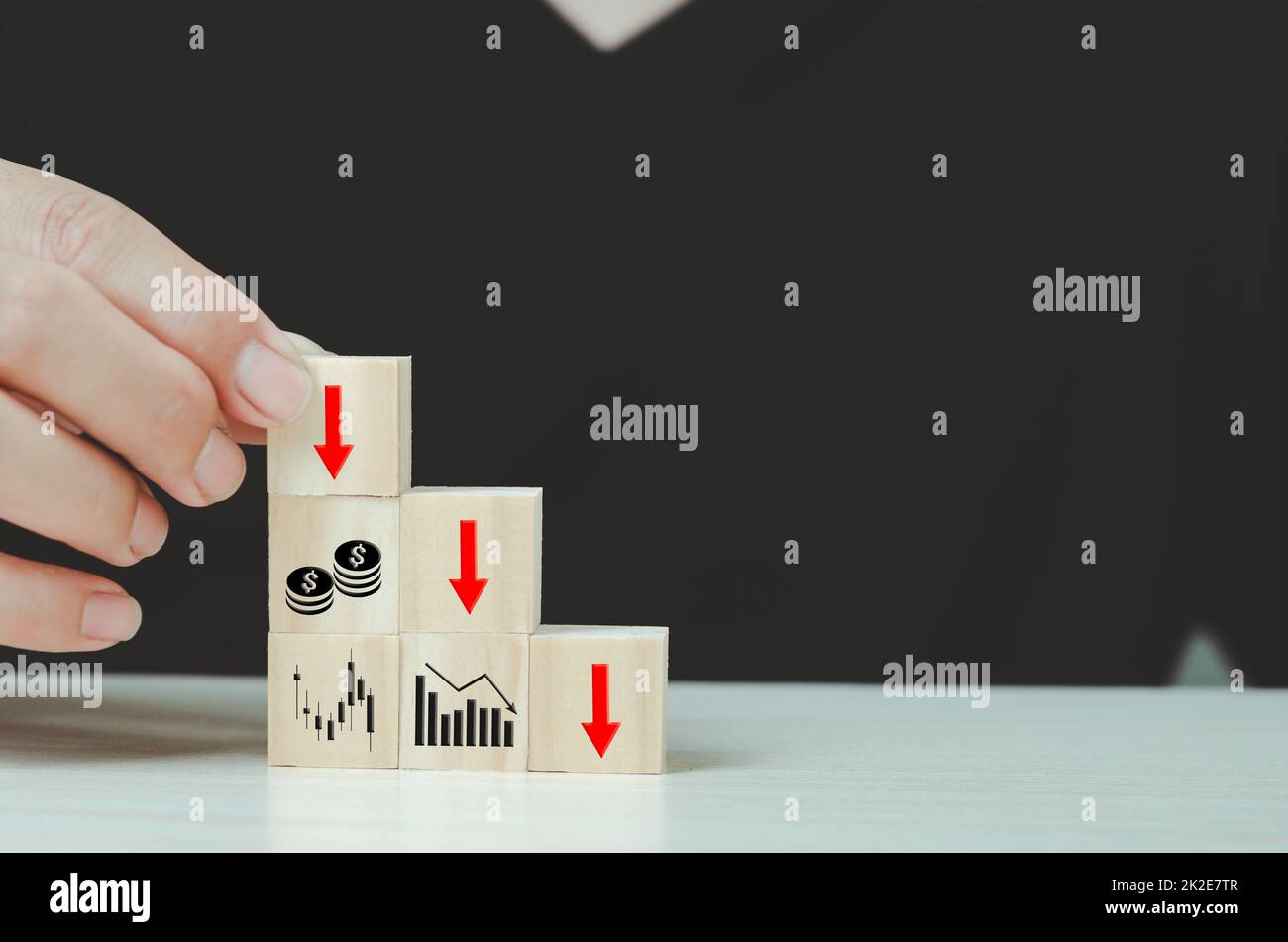 Hand putting and stacking wooden cubes for icons or symbols Stock ...