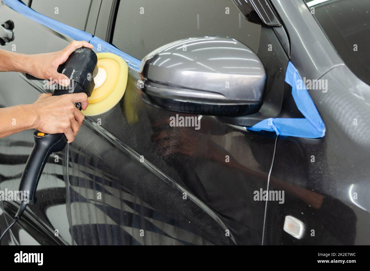 Man working for polishing, coating cars. polishing of the car will help ...