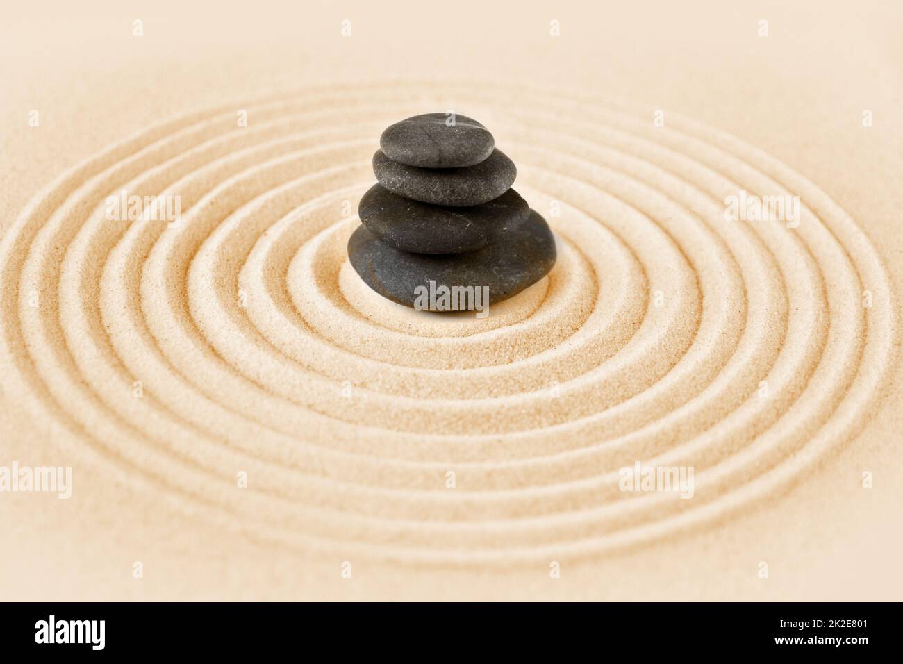 Zen japanese garden and black stones background Stock Photo - Alamy