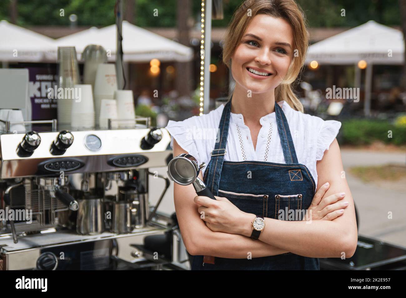 Beautiful barista woman during work in her street coffee shop Stock ...