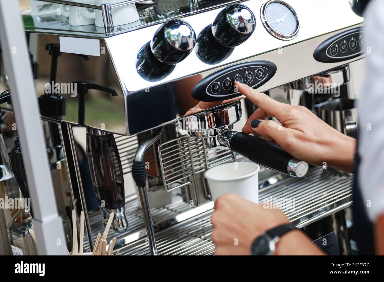 Barista making coffee using professional espresso machine Stock Photo ...