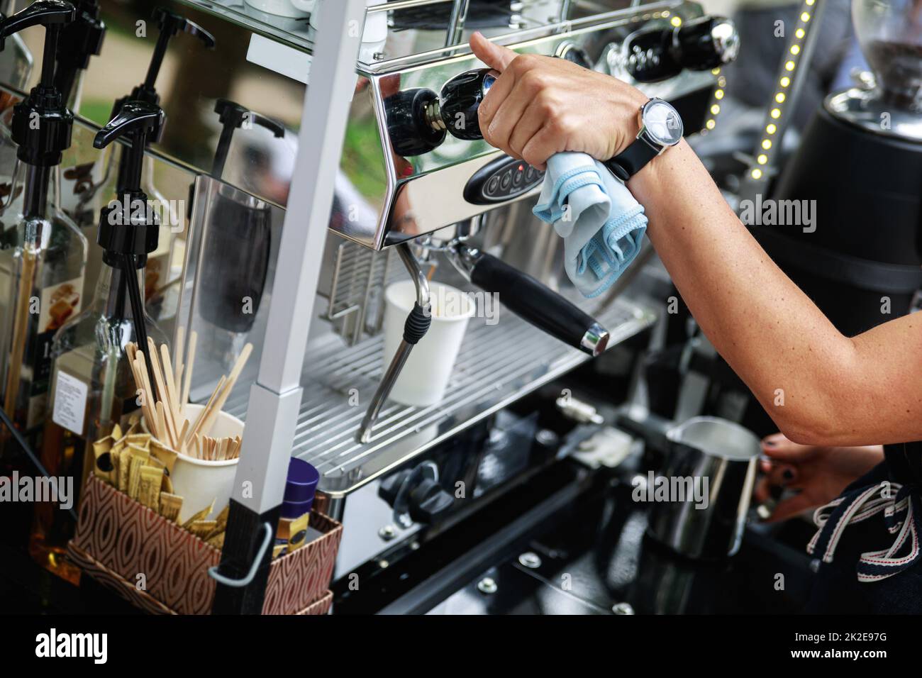 Barista making coffee using professional espresso machine Stock Photo ...