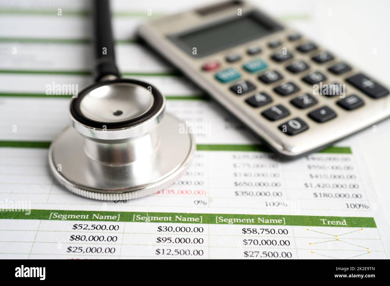 Spreadsheet table paper with stethoscope. Finance development, Banking ...