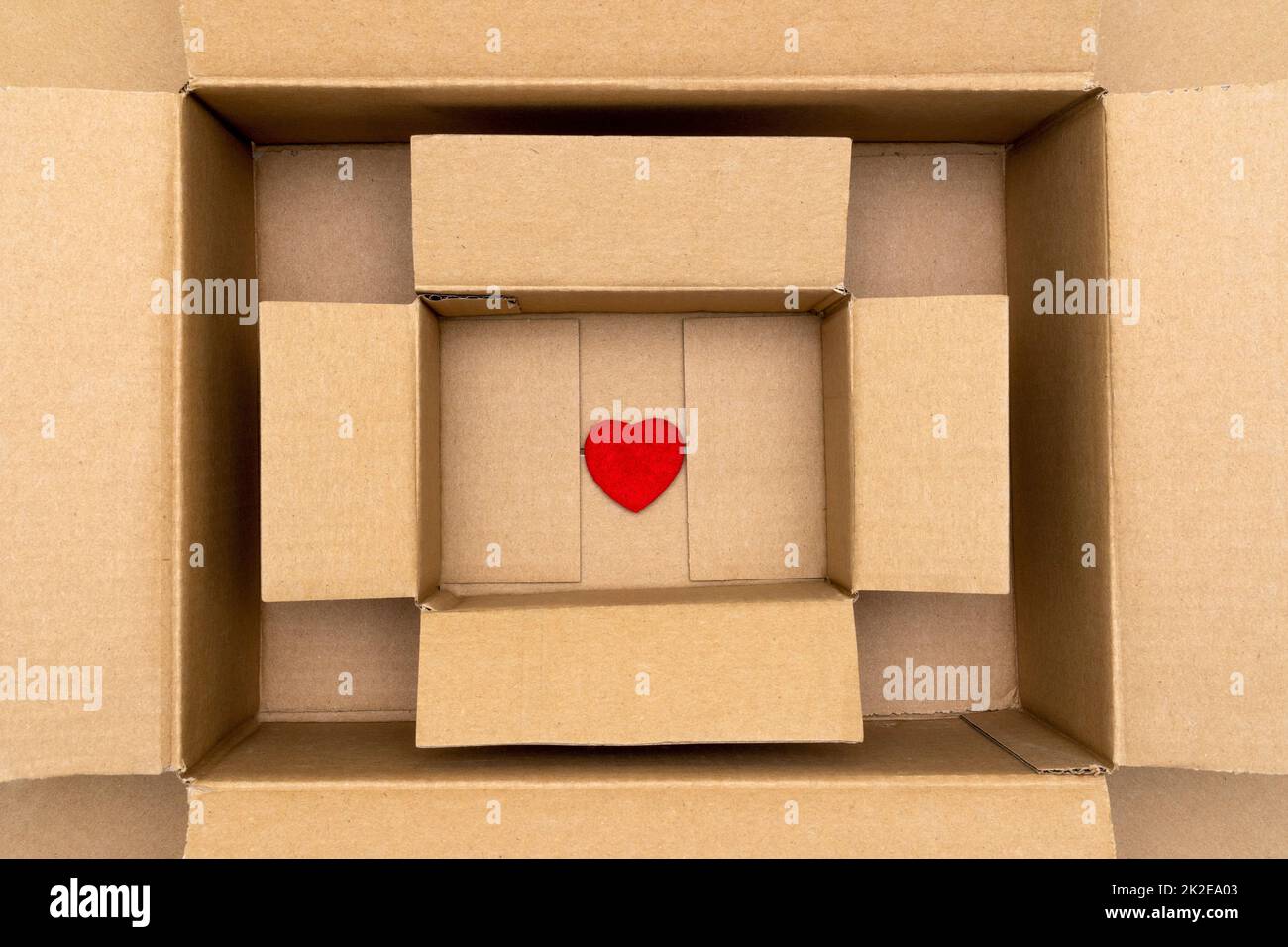 Red heart at bottom in box Stock Photo - Alamy